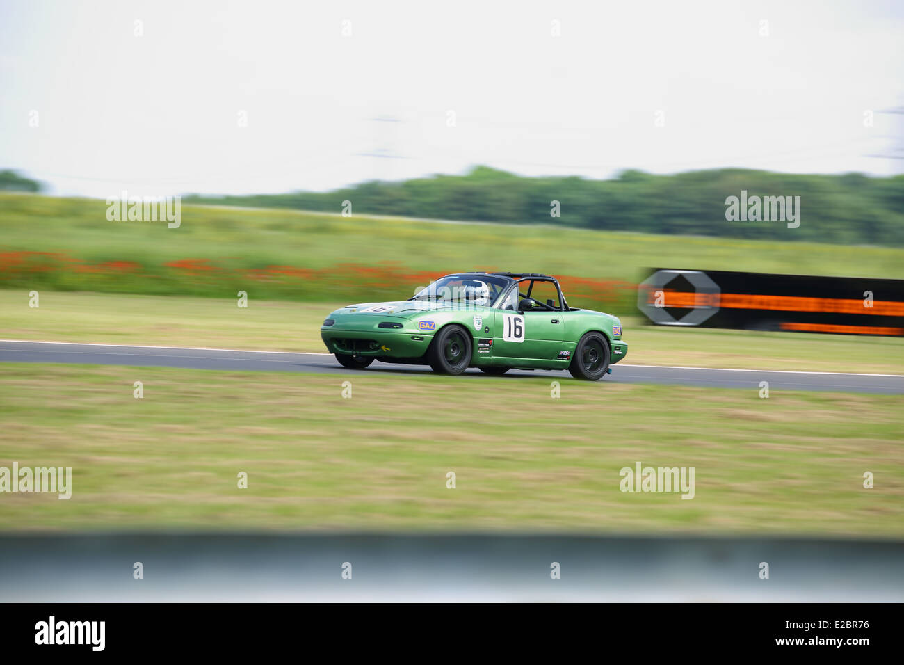 Cars racing at Castle Combe Circuit Stock Photo - Alamy