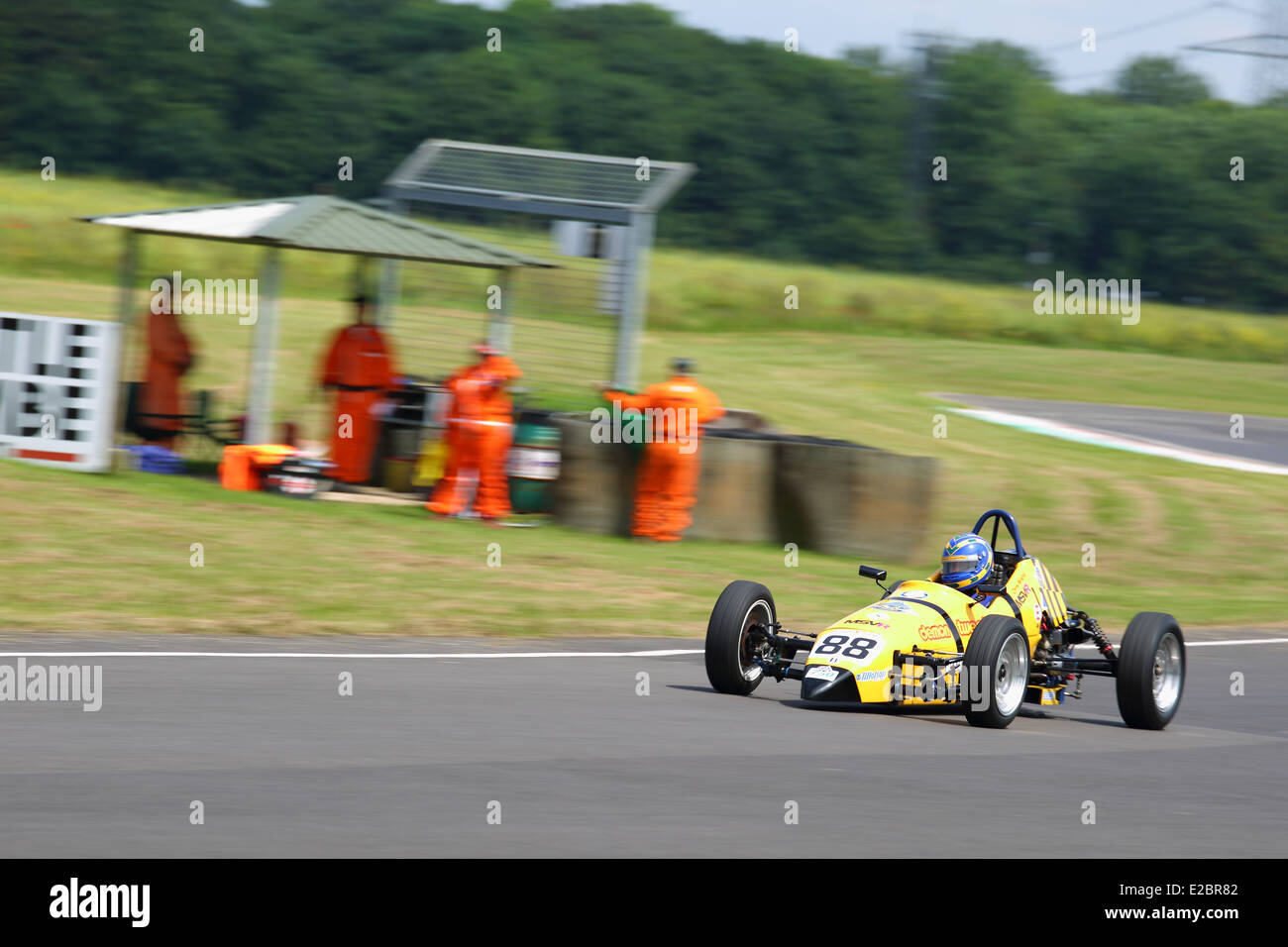 Cars racing at Castle Combe Circuit Stock Photo - Alamy