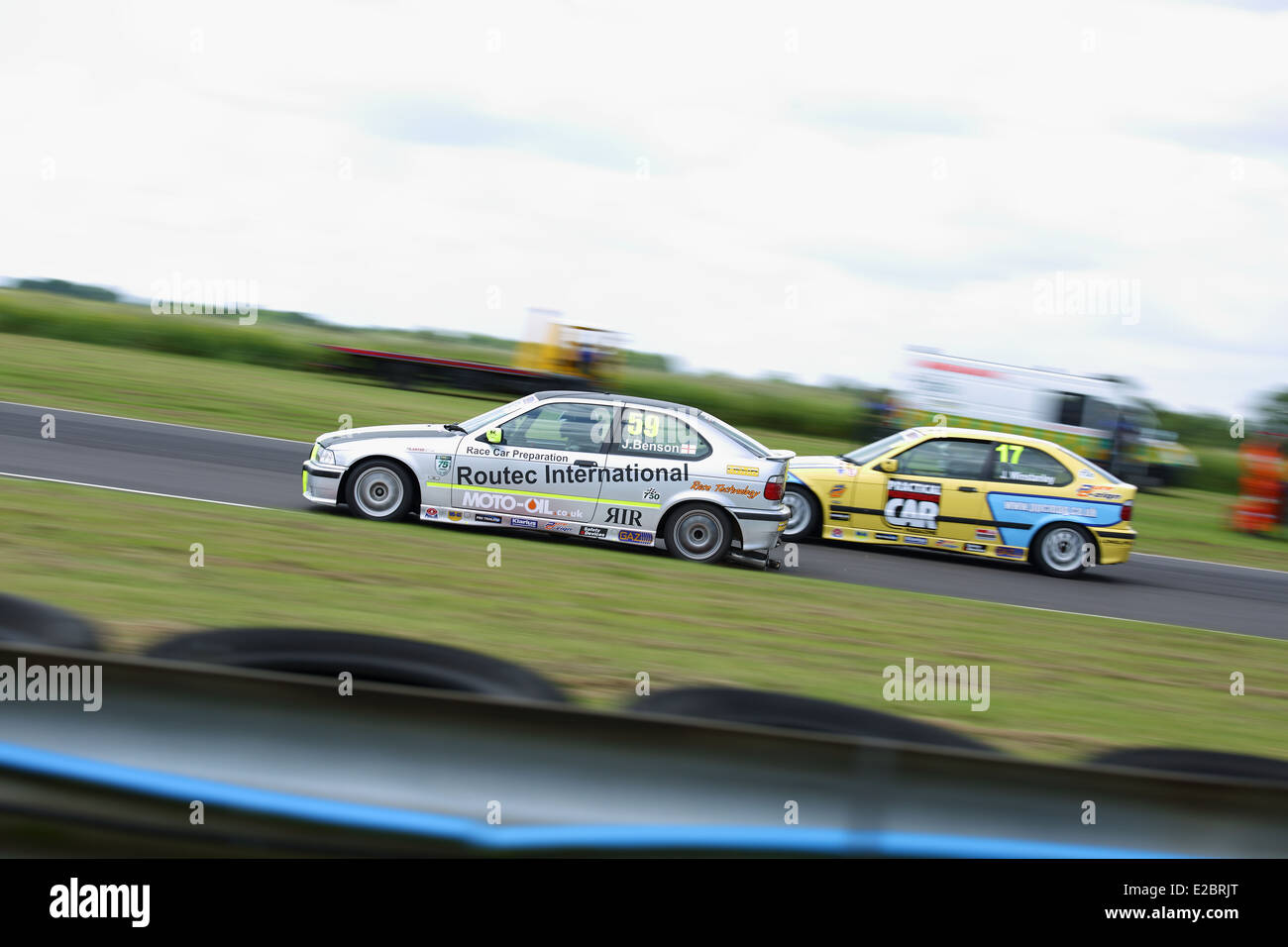 Cars racing at Castle Combe Circuit Stock Photo - Alamy
