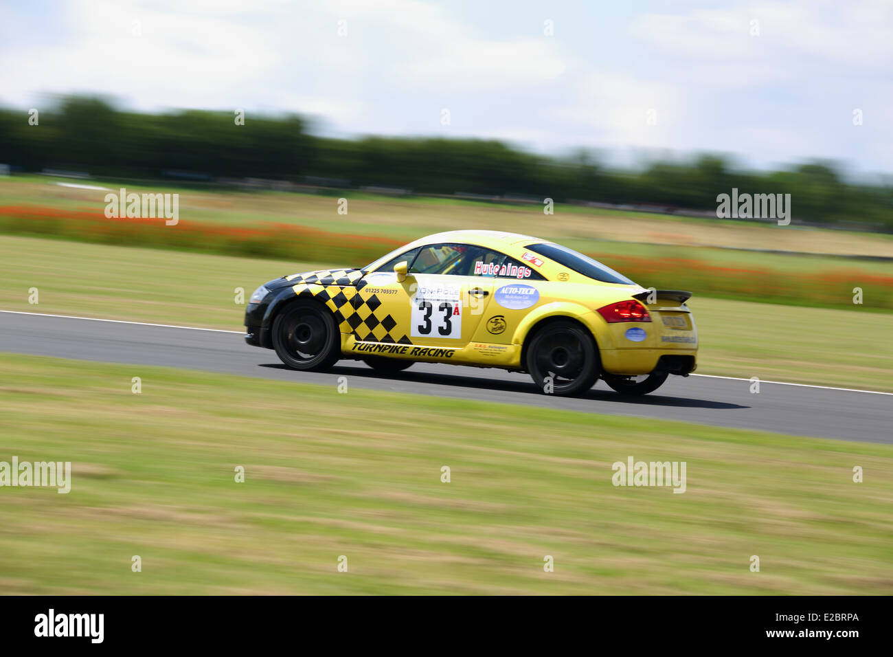 Cars racing at Castle Combe Circuit Stock Photo - Alamy