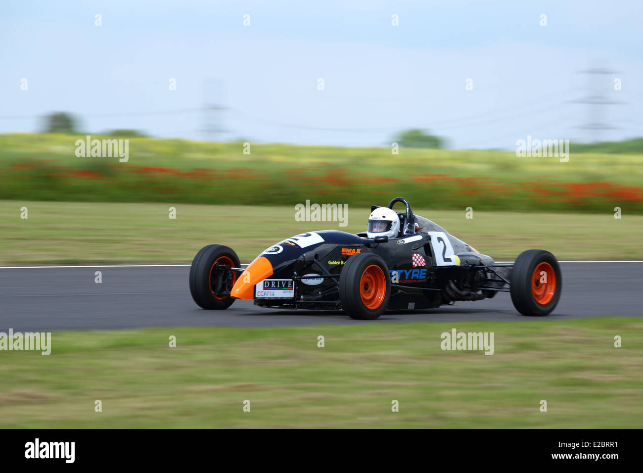 Cars racing at Castle Combe Circuit Stock Photo - Alamy