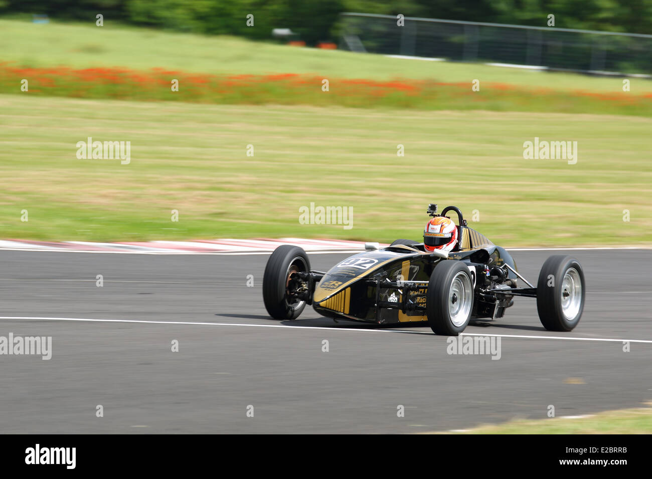 Cars racing at Castle Combe Circuit Stock Photo - Alamy