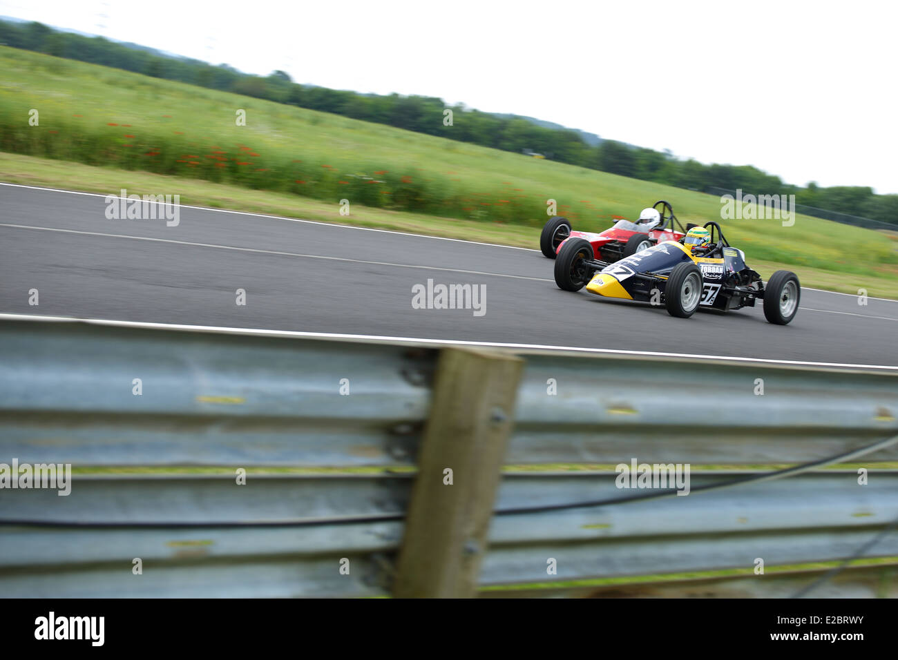 Cars racing at Castle Combe Circuit Stock Photo - Alamy