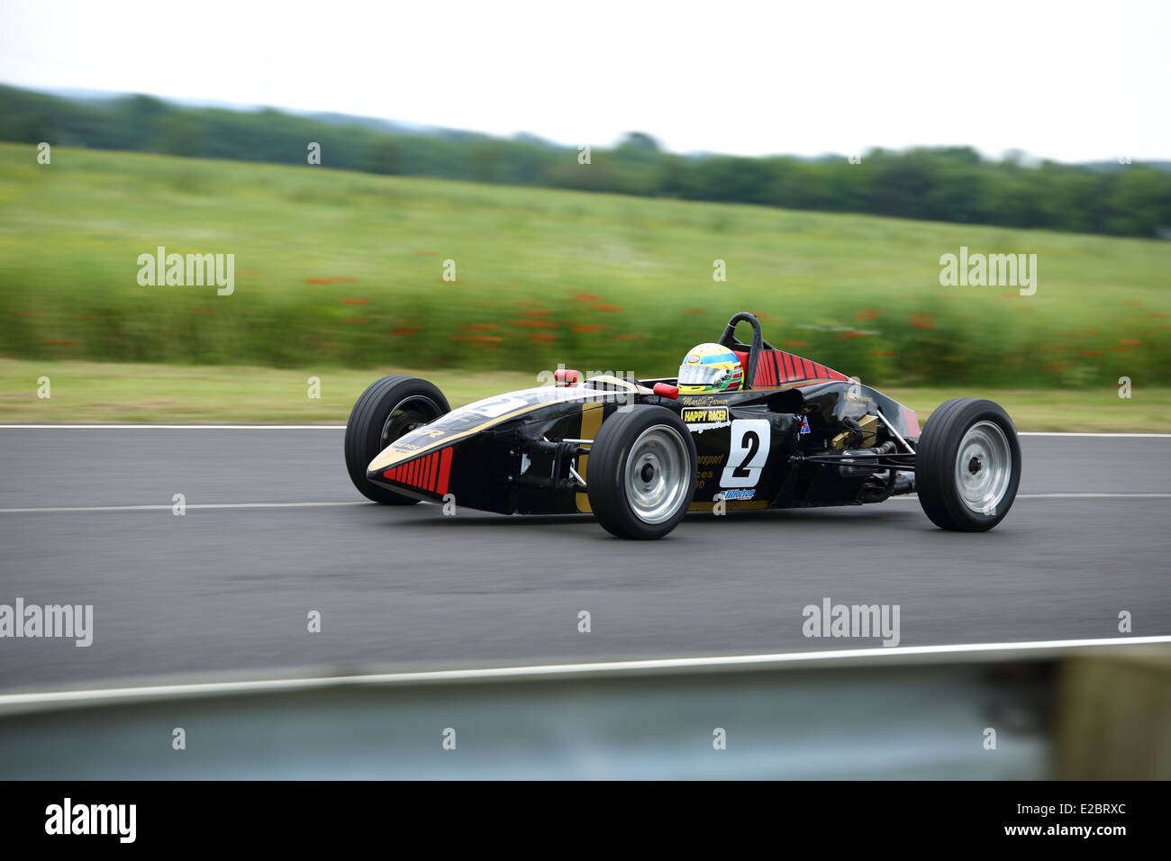 Cars racing at Castle Combe Circuit Stock Photo - Alamy