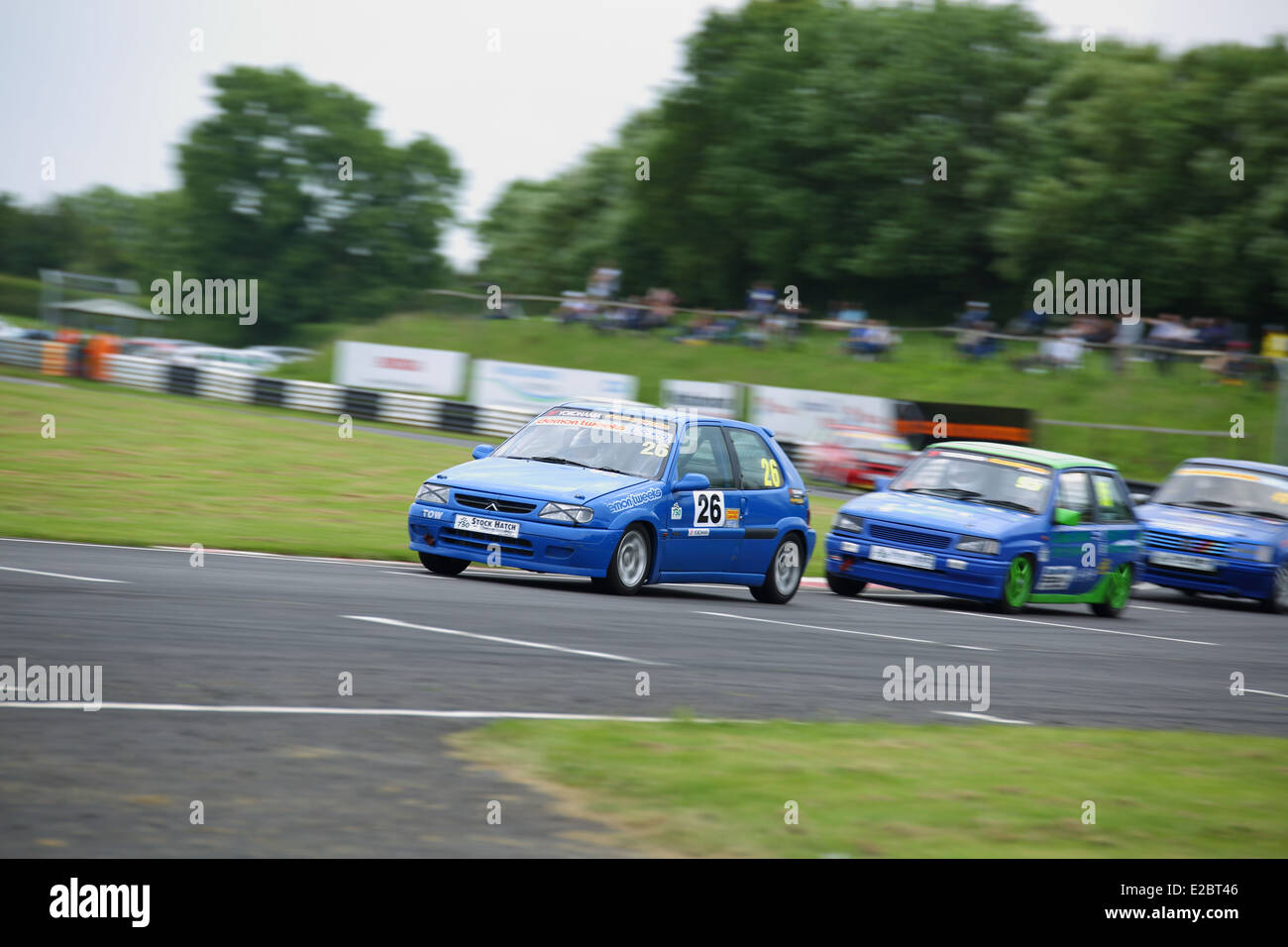 Cars racing at Castle Combe Circuit Stock Photo - Alamy