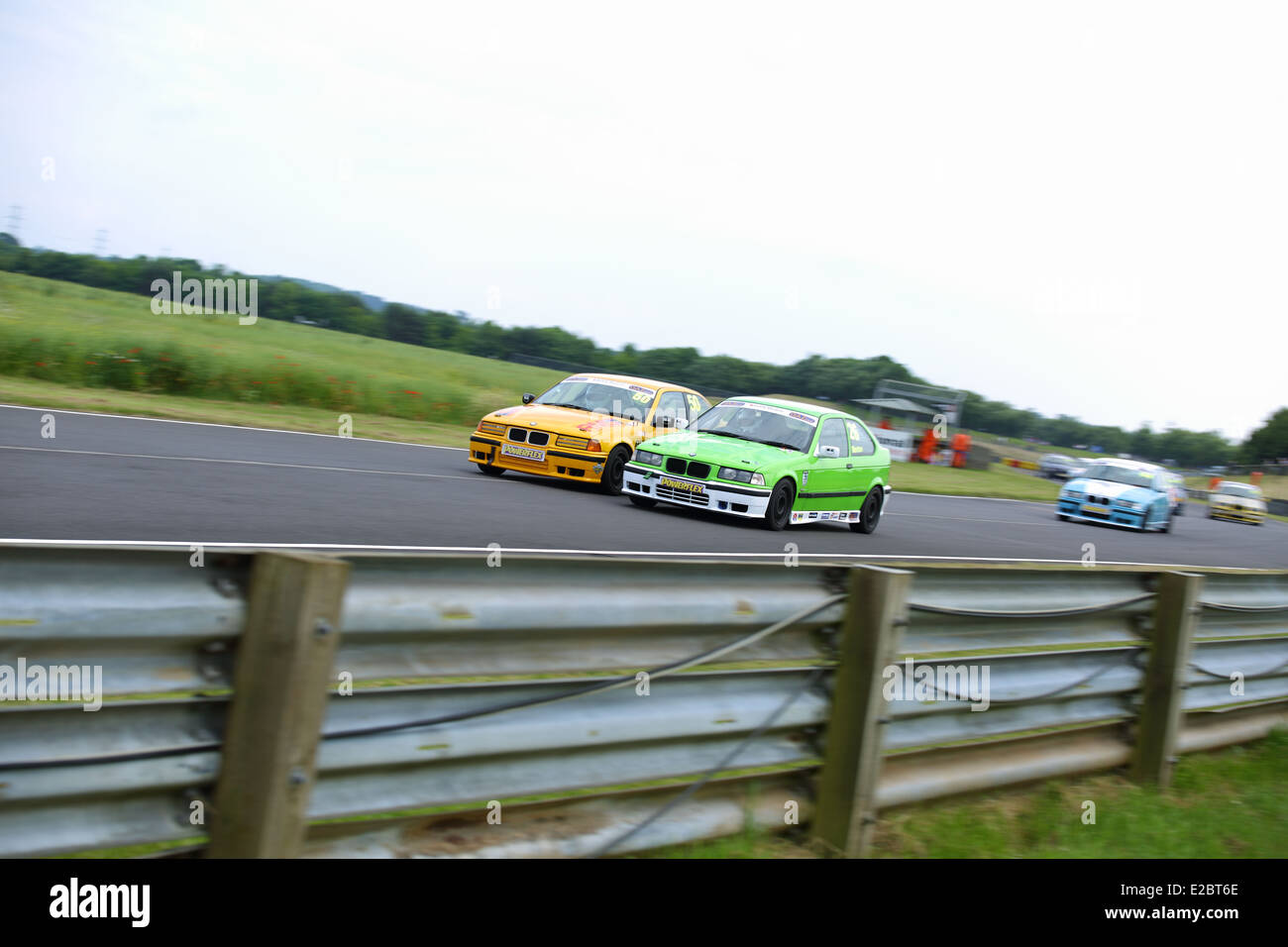Cars racing at Castle Combe Circuit Stock Photo - Alamy