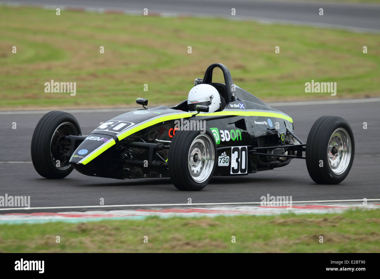 Cars racing at Castle Combe Circuit Stock Photo - Alamy