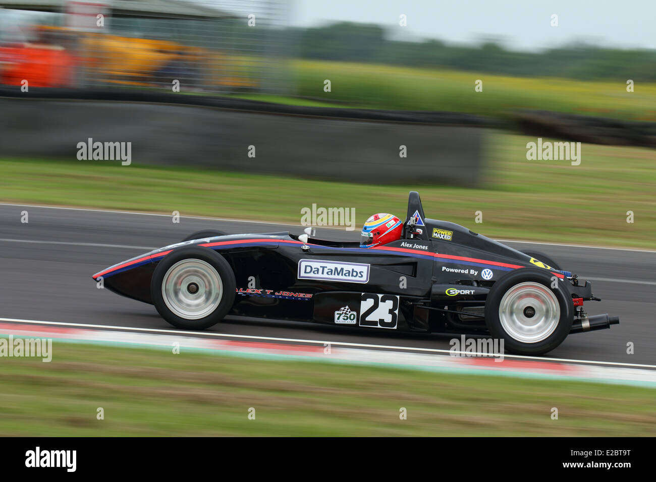 Cars racing at Castle Combe Circuit Stock Photo - Alamy