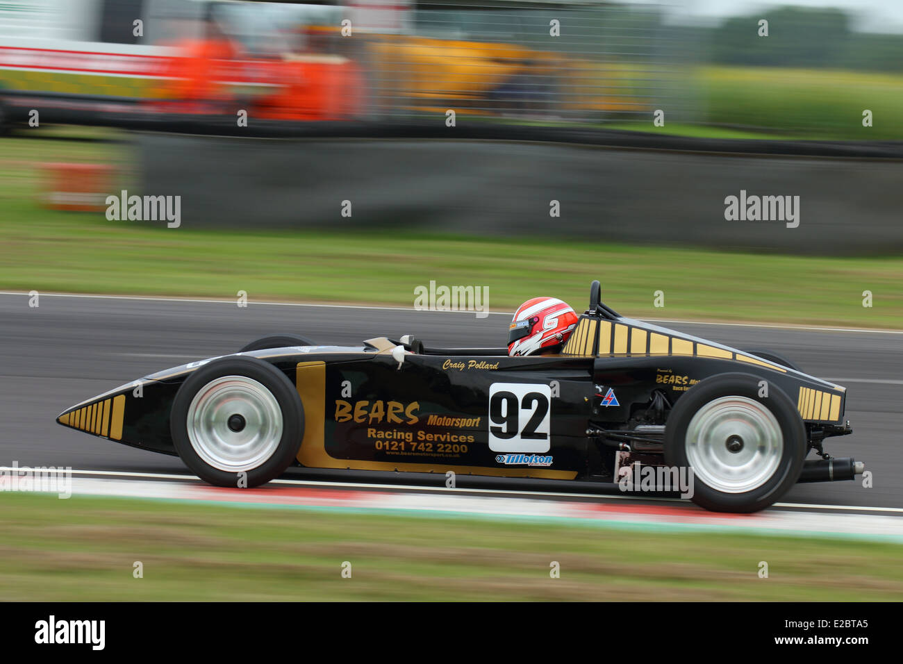 Cars racing at Castle Combe Circuit Stock Photo - Alamy