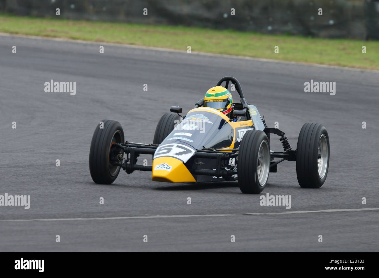 Cars racing at Castle Combe Circuit Stock Photo - Alamy