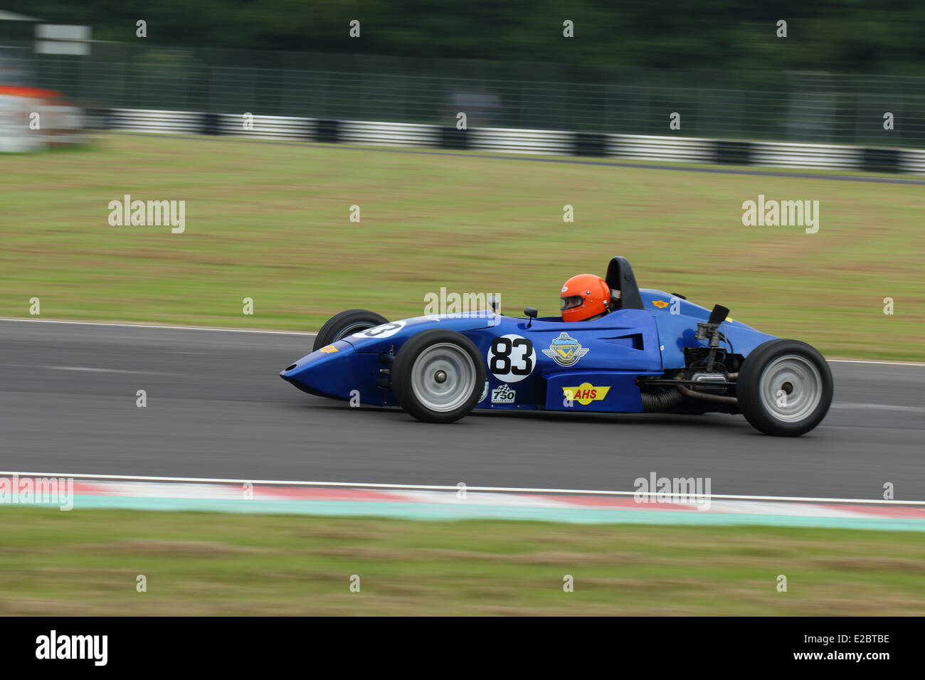 Cars racing at Castle Combe Circuit Stock Photo - Alamy