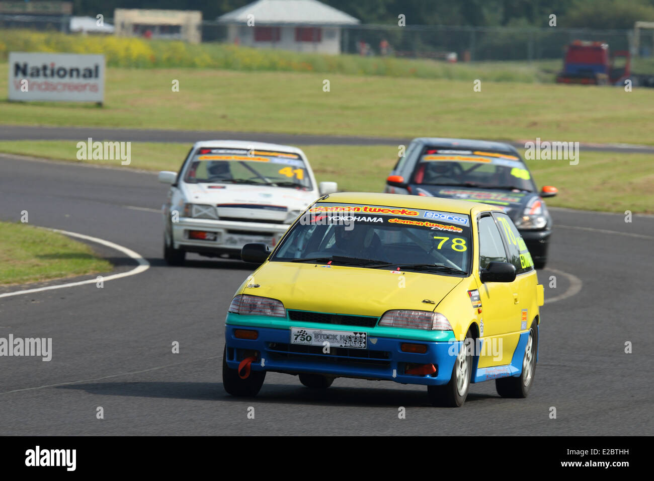 Cars racing at Castle Combe Circuit Stock Photo - Alamy