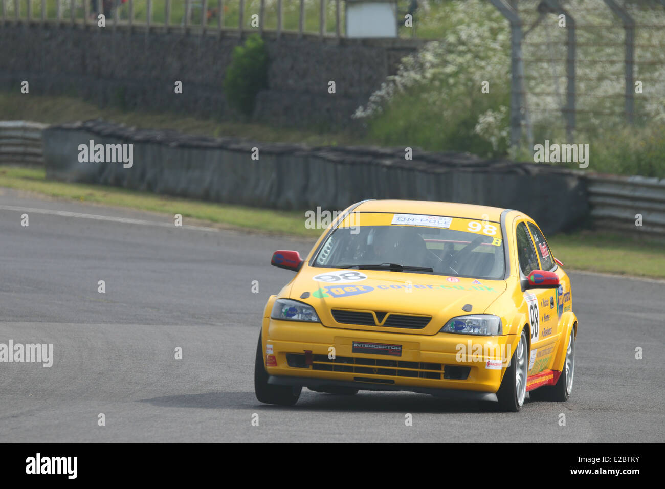 Cars racing at Castle Combe Circuit Stock Photo - Alamy