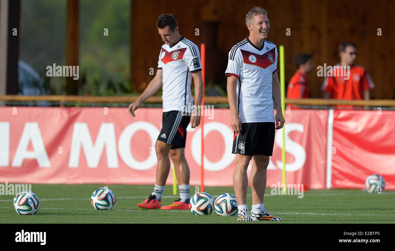 Santo Andre, Brazil. 18th June, 2014. Bastian Schweinsteiger (r) and ...
