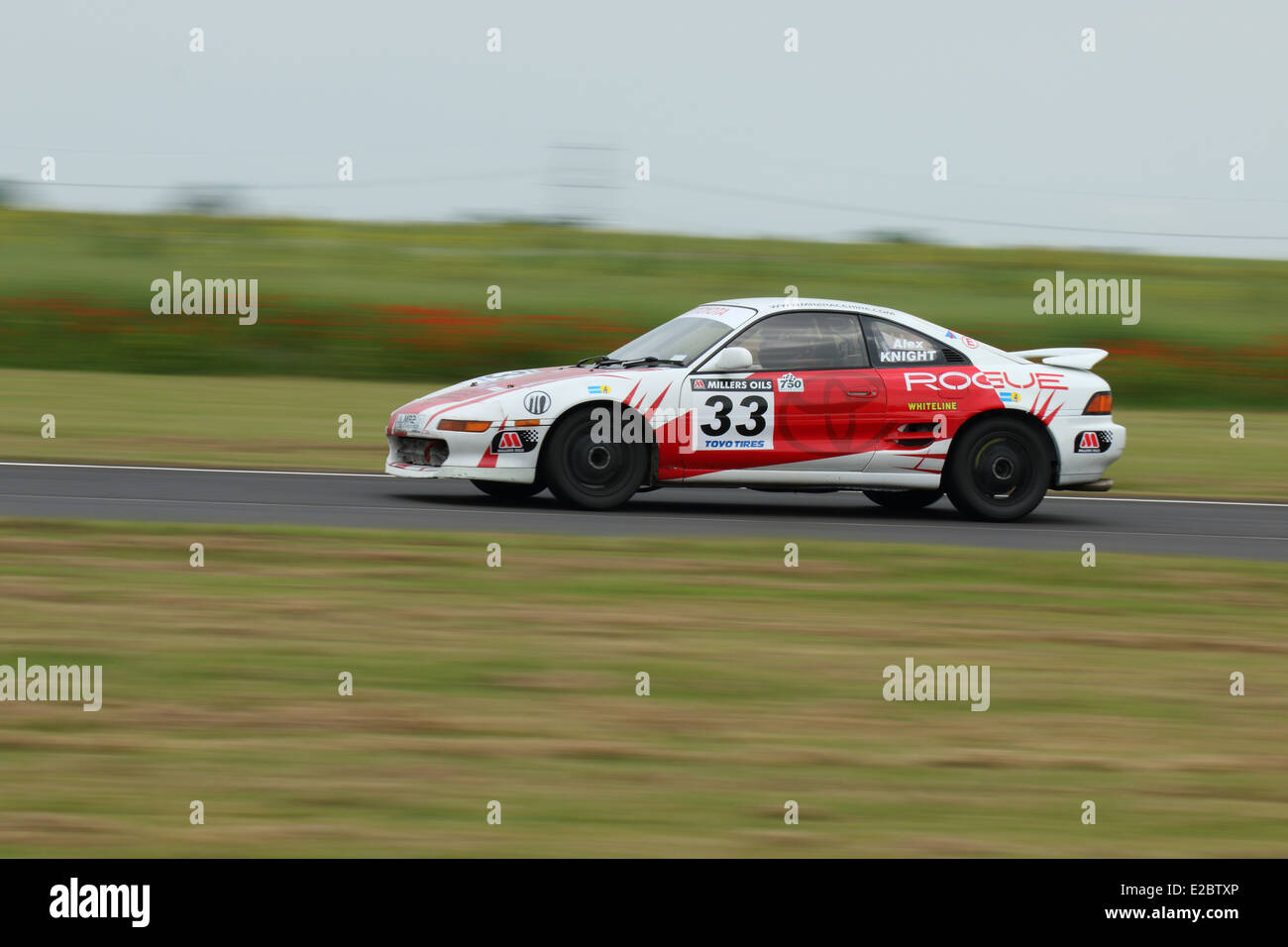 Cars racing at Castle Combe Circuit Stock Photo - Alamy