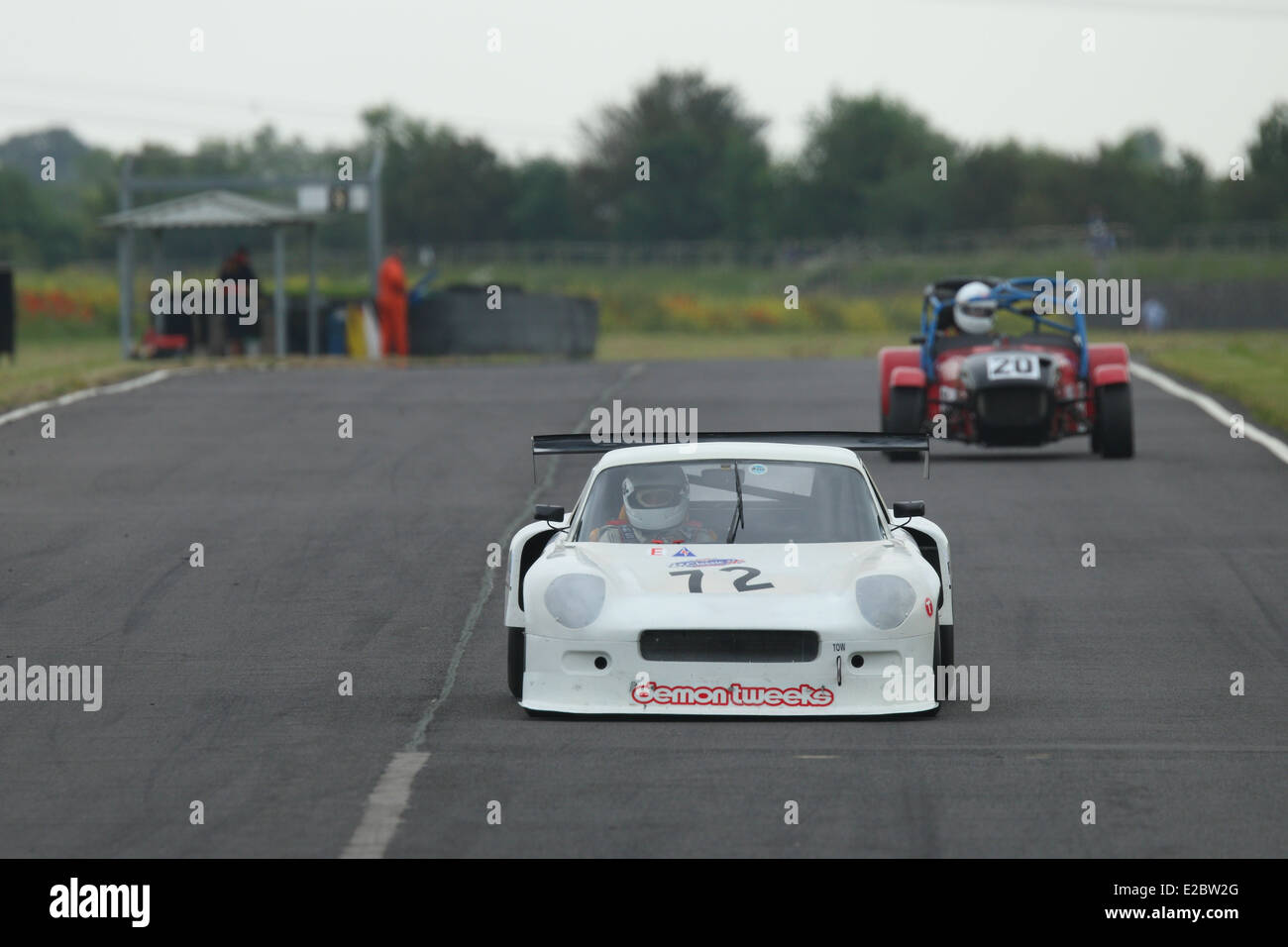 Cars racing at Castle Combe Circuit Stock Photo - Alamy