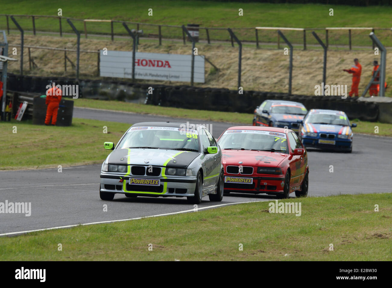Cars racing at Castle Combe Circuit Stock Photo - Alamy