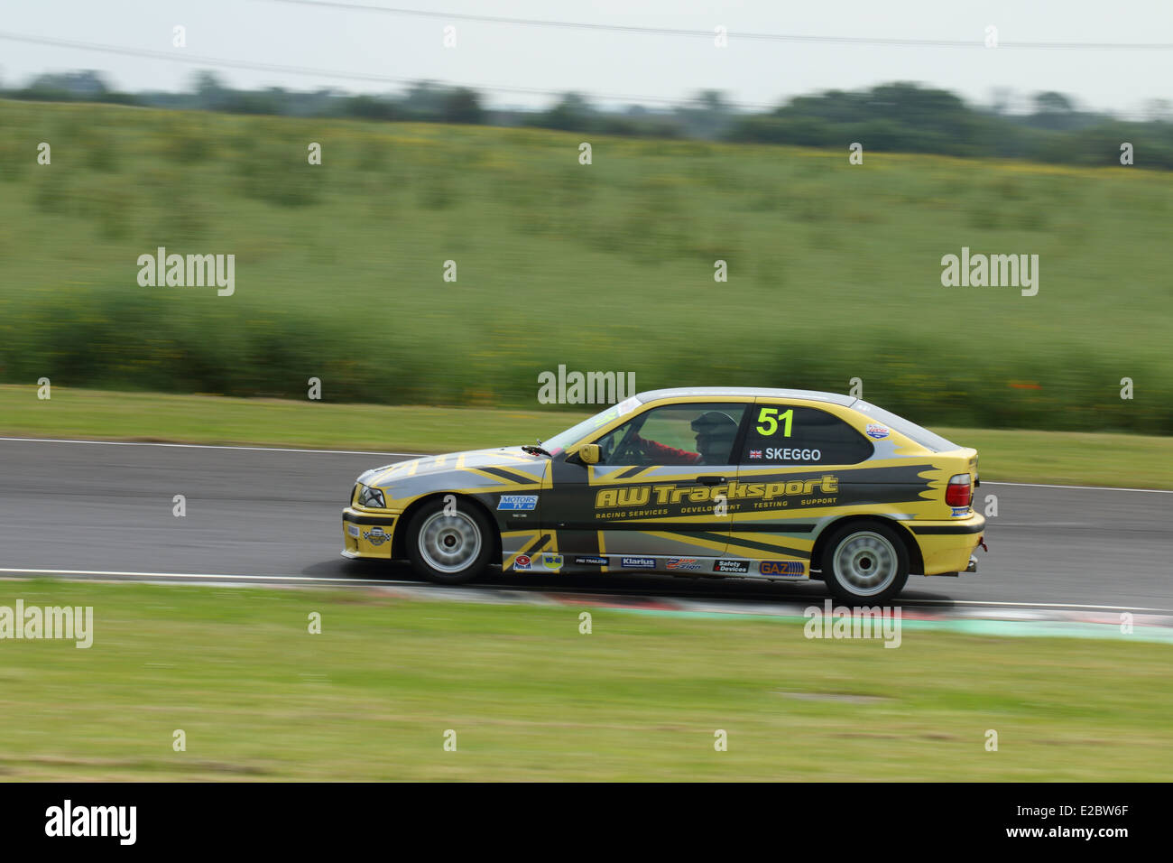 Cars racing at Castle Combe Circuit Stock Photo - Alamy