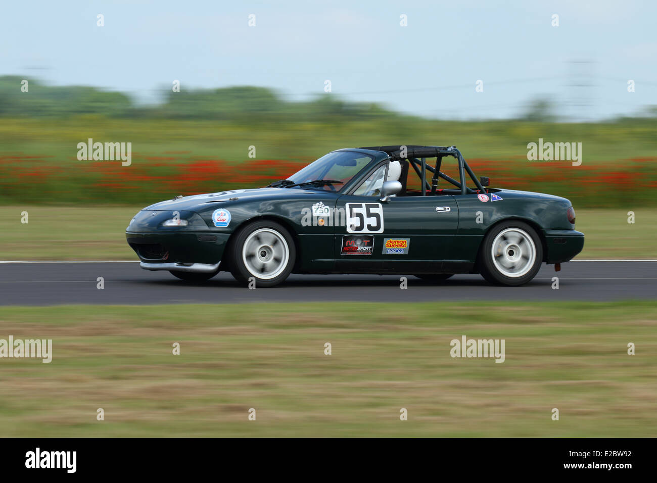 Cars racing at Castle Combe Circuit Stock Photo - Alamy
