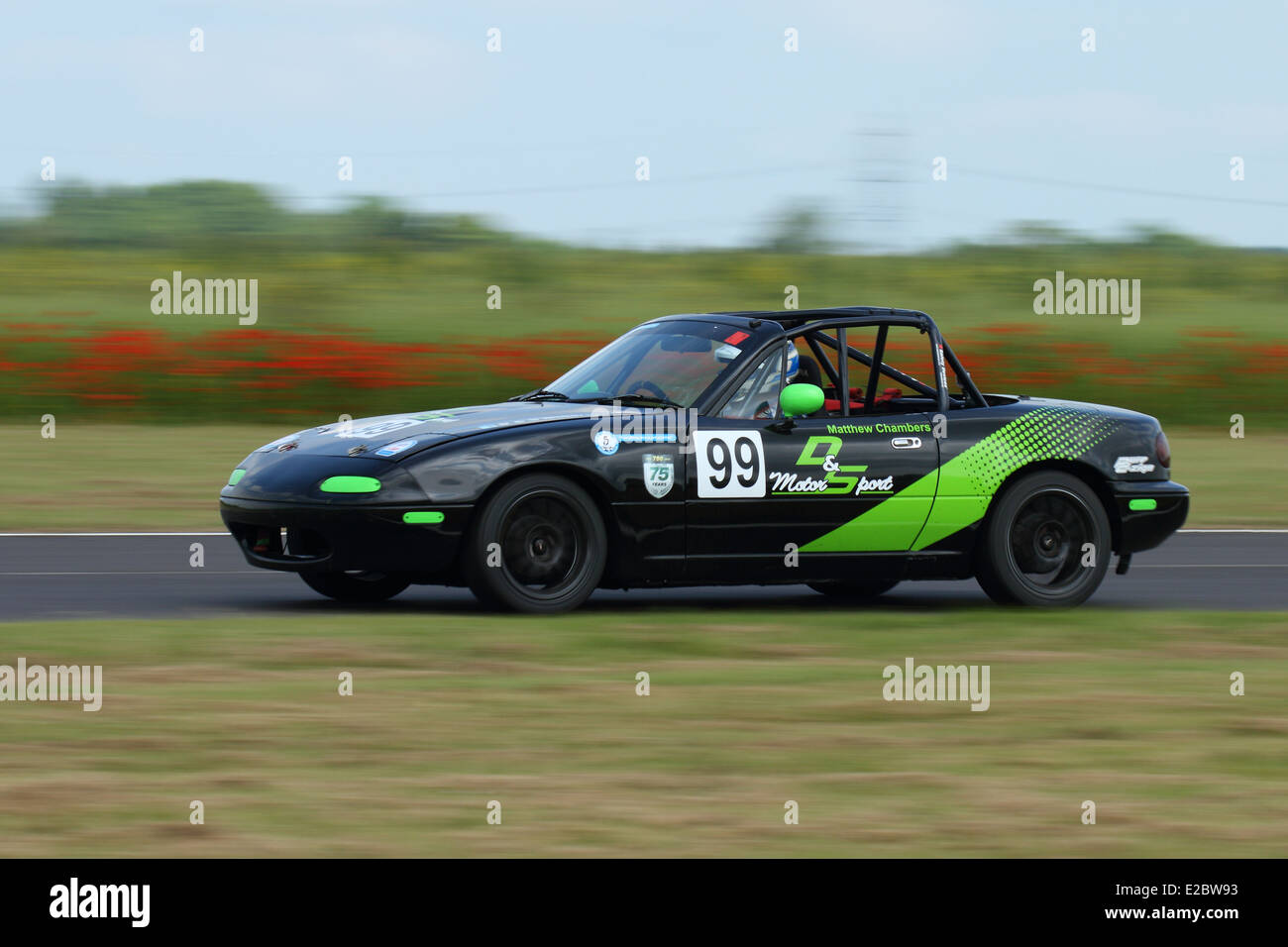 Cars racing at Castle Combe Circuit Stock Photo - Alamy