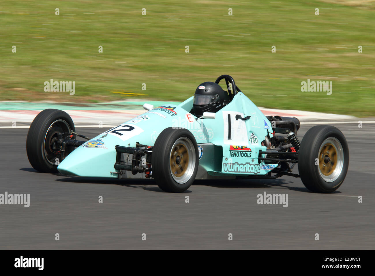 Cars racing at Castle Combe Circuit Stock Photo - Alamy