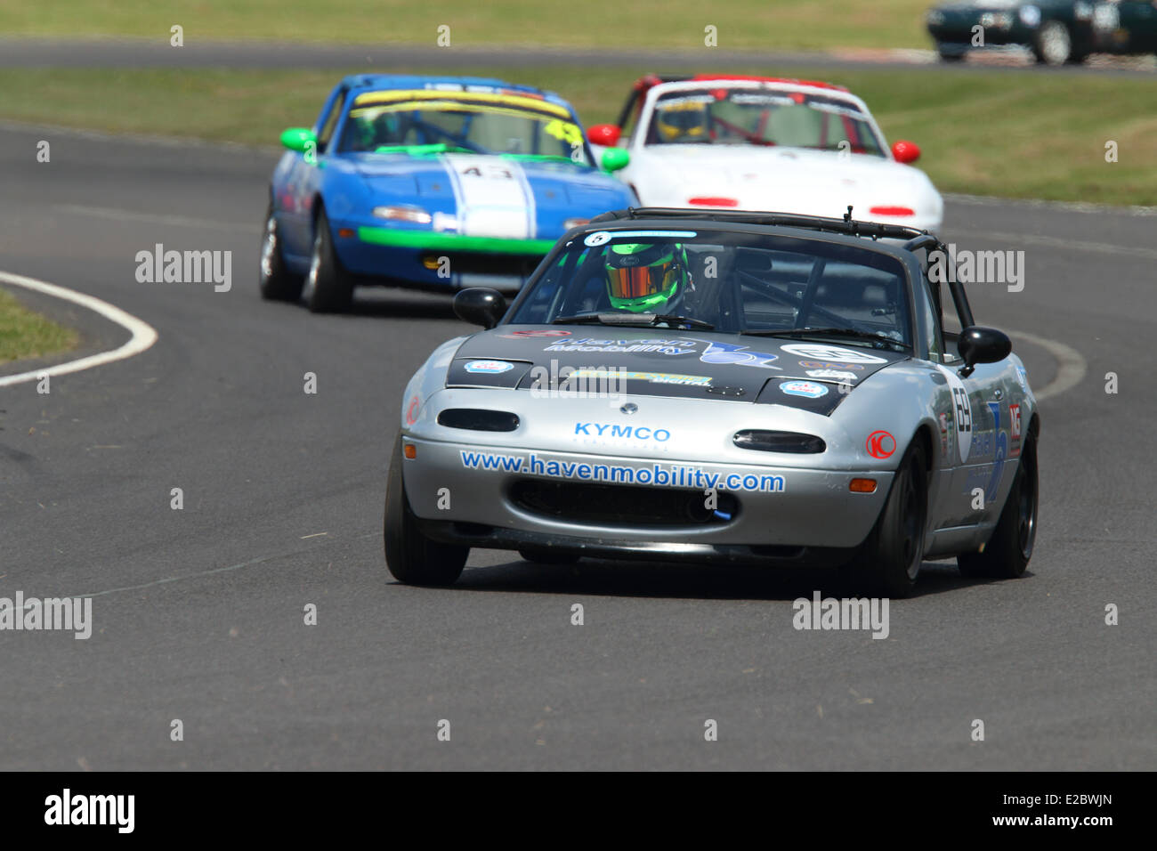 Cars racing at Castle Combe Circuit Stock Photo - Alamy