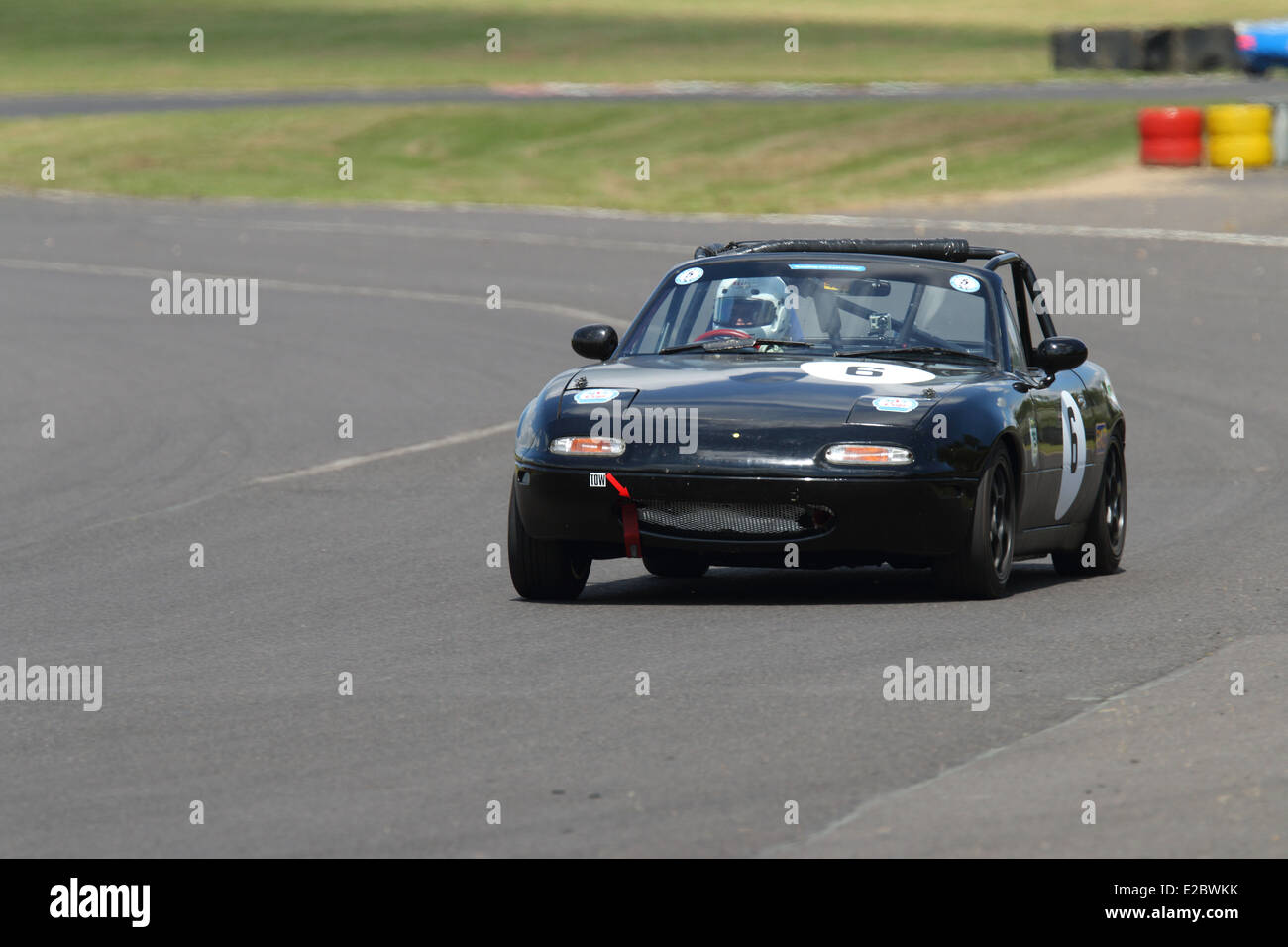 Cars racing at Castle Combe Circuit Stock Photo - Alamy