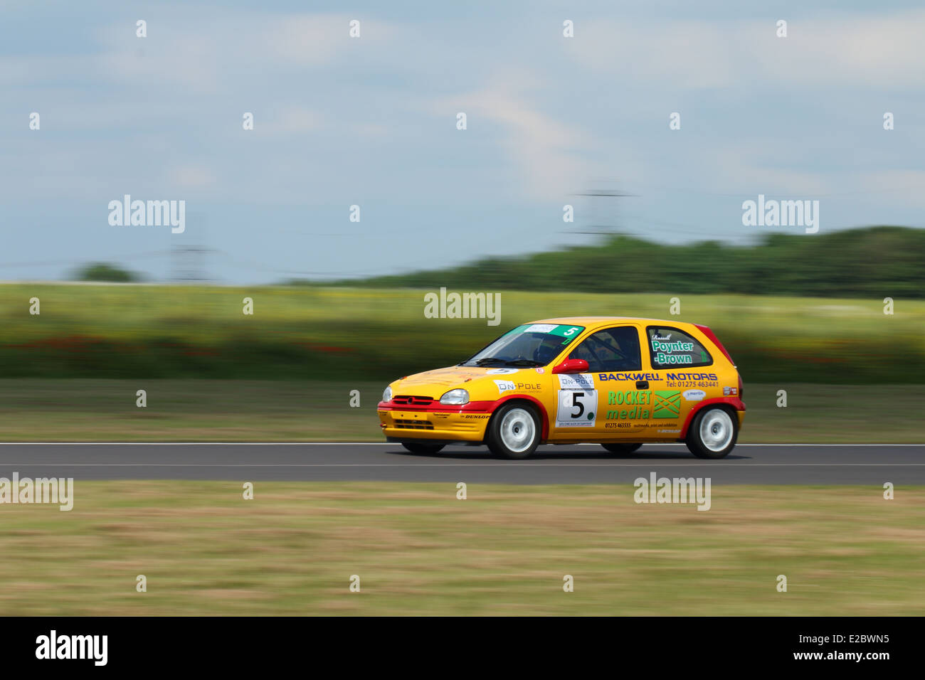 Cars racing at Castle Combe Circuit Stock Photo - Alamy