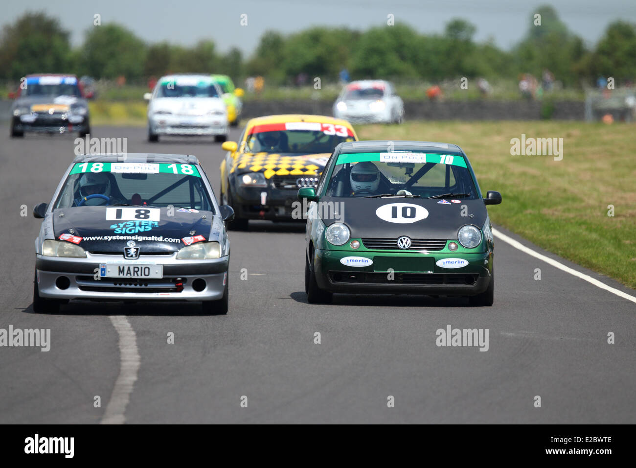 Cars racing at Castle Combe Circuit Stock Photo - Alamy