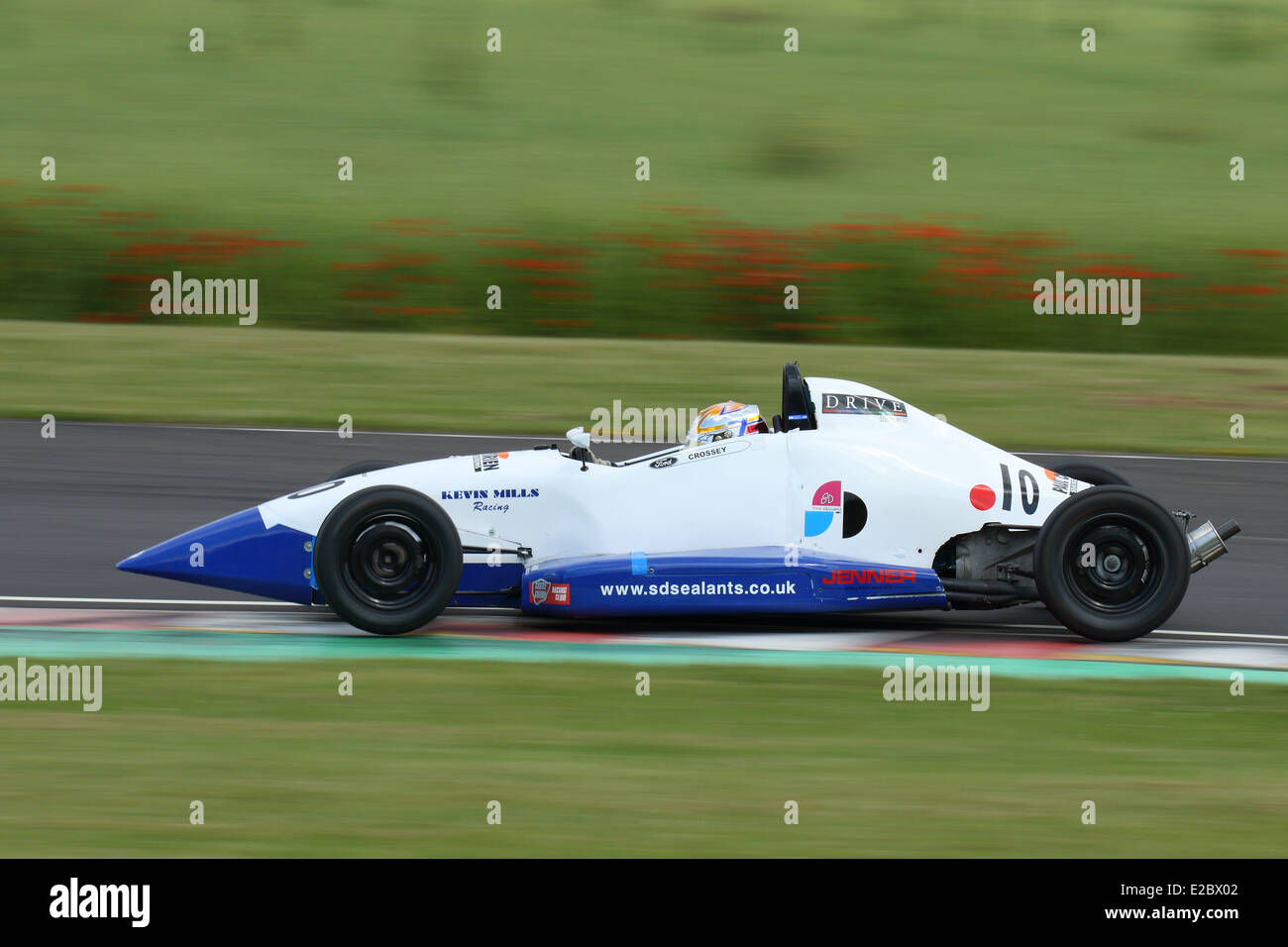 Cars racing at Castle Combe Circuit Stock Photo - Alamy