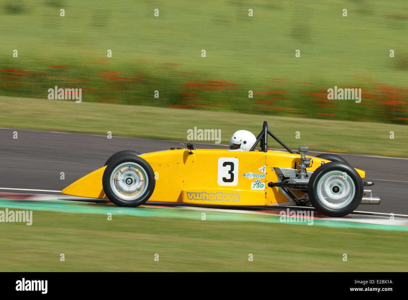 Cars racing at Castle Combe Circuit Stock Photo - Alamy