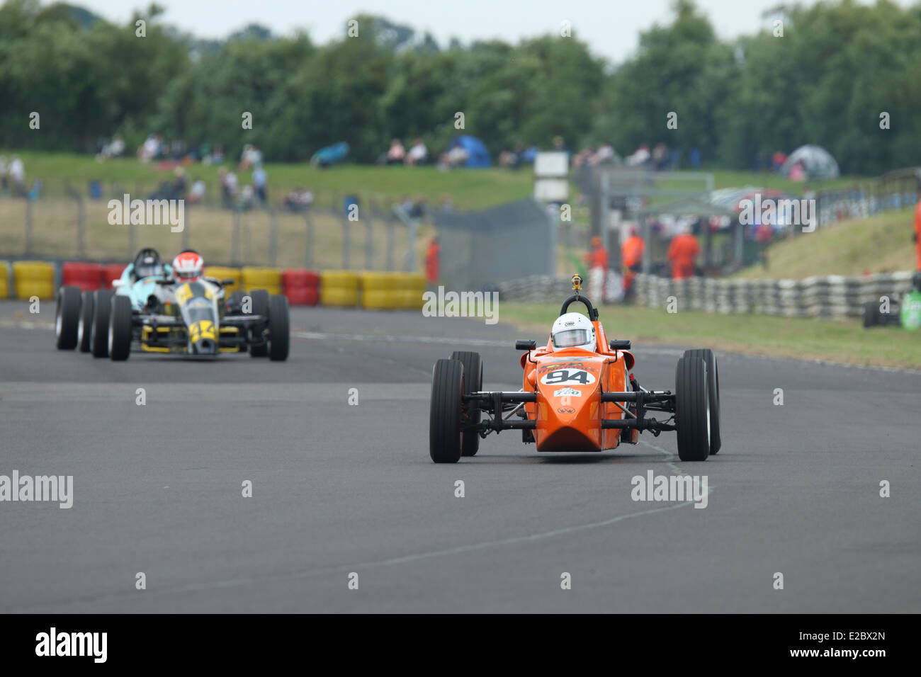 Cars racing at Castle Combe Circuit Stock Photo - Alamy