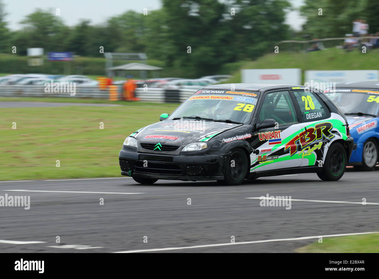 Cars racing at Castle Combe Circuit Stock Photo - Alamy