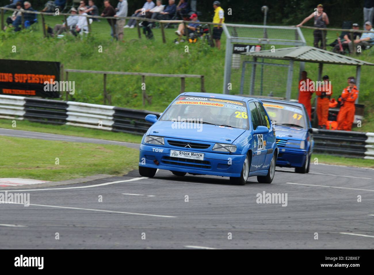 Cars racing at Castle Combe Circuit Stock Photo - Alamy