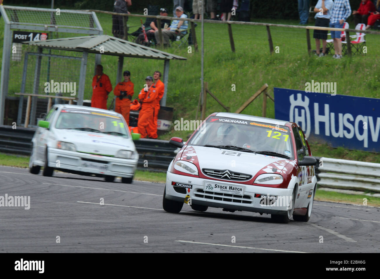 Cars racing at Castle Combe Circuit Stock Photo - Alamy