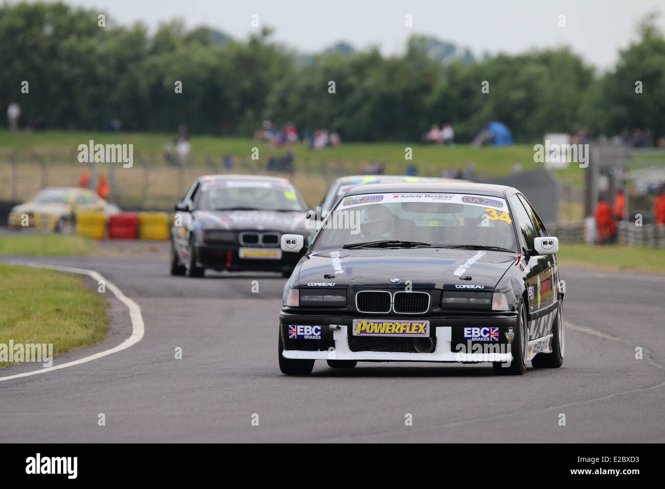 Cars racing at Castle Combe Circuit Stock Photo - Alamy