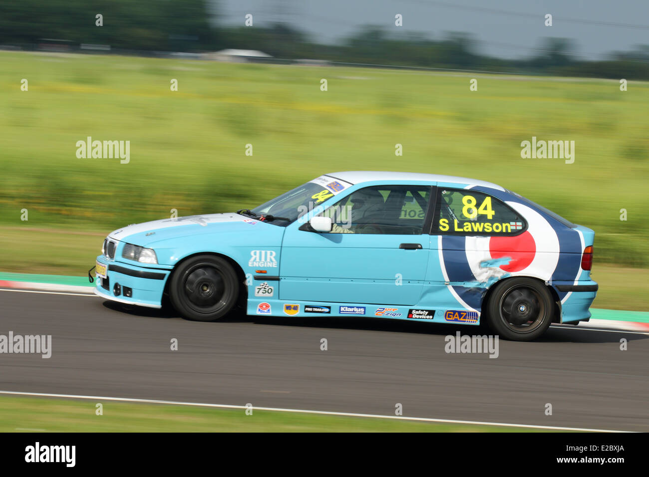 Cars racing at Castle Combe Circuit Stock Photo - Alamy