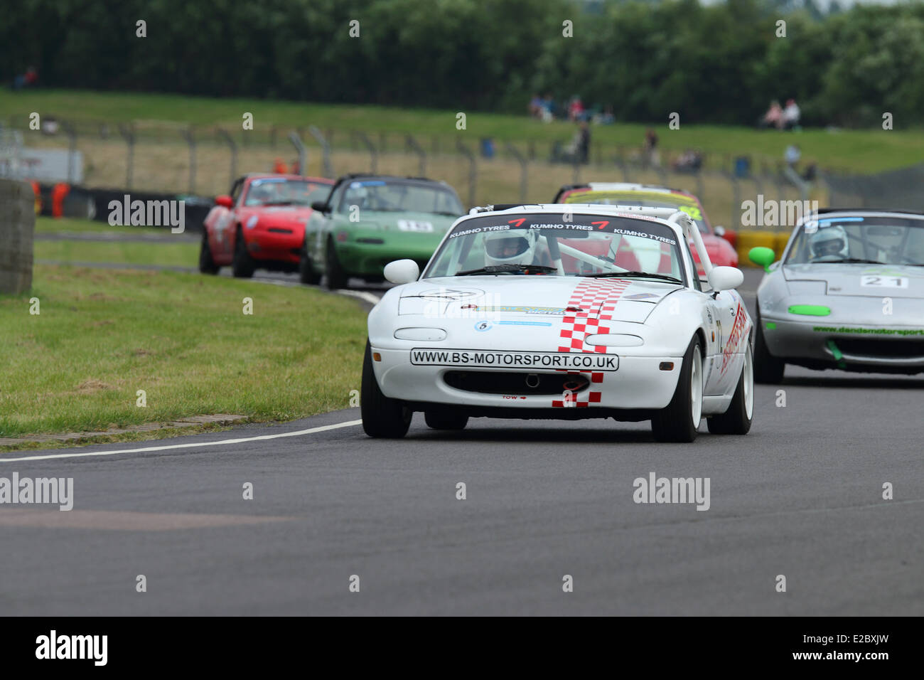 Cars racing at Castle Combe Circuit Stock Photo - Alamy
