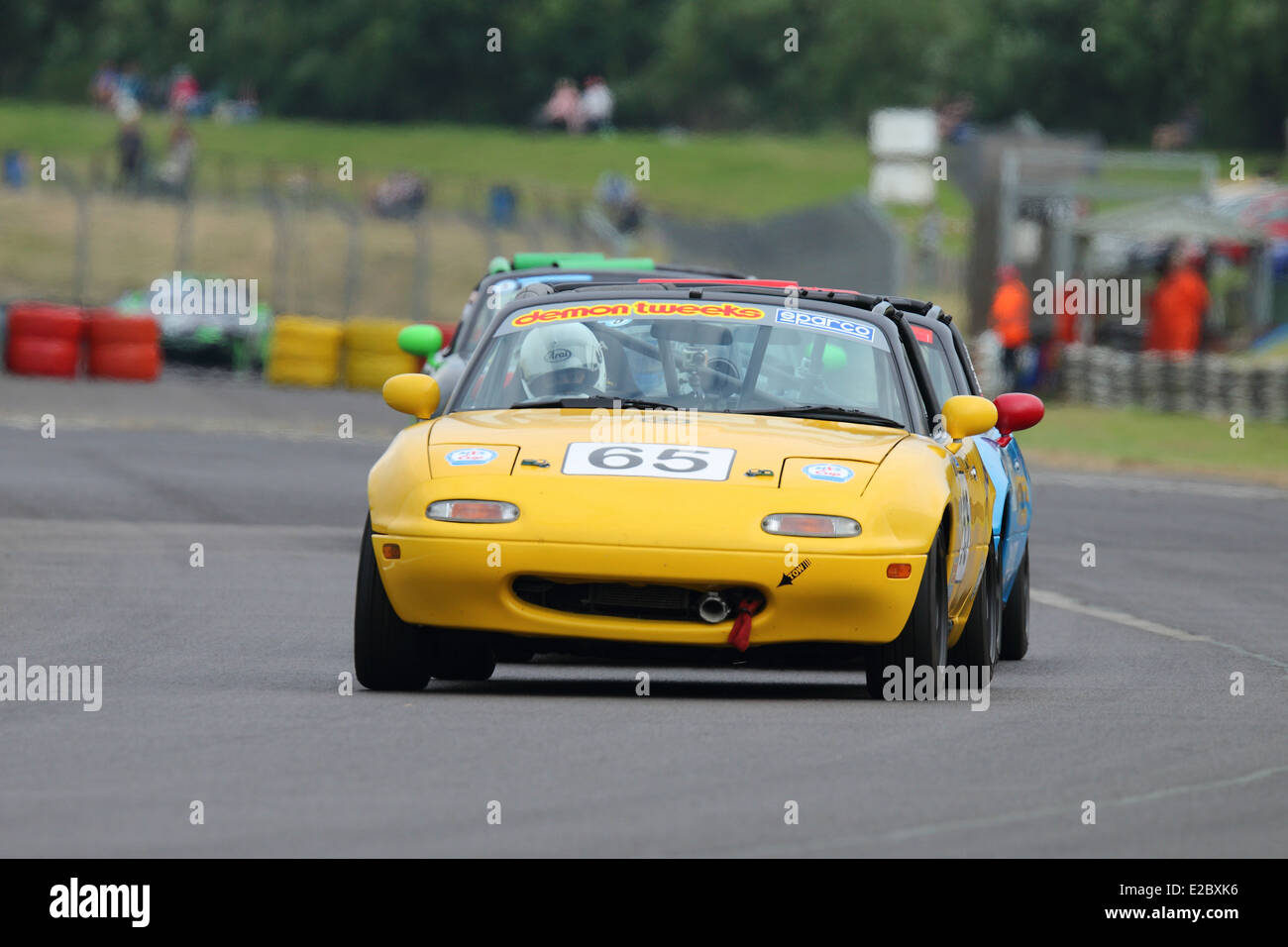 Cars racing at Castle Combe Circuit Stock Photo - Alamy