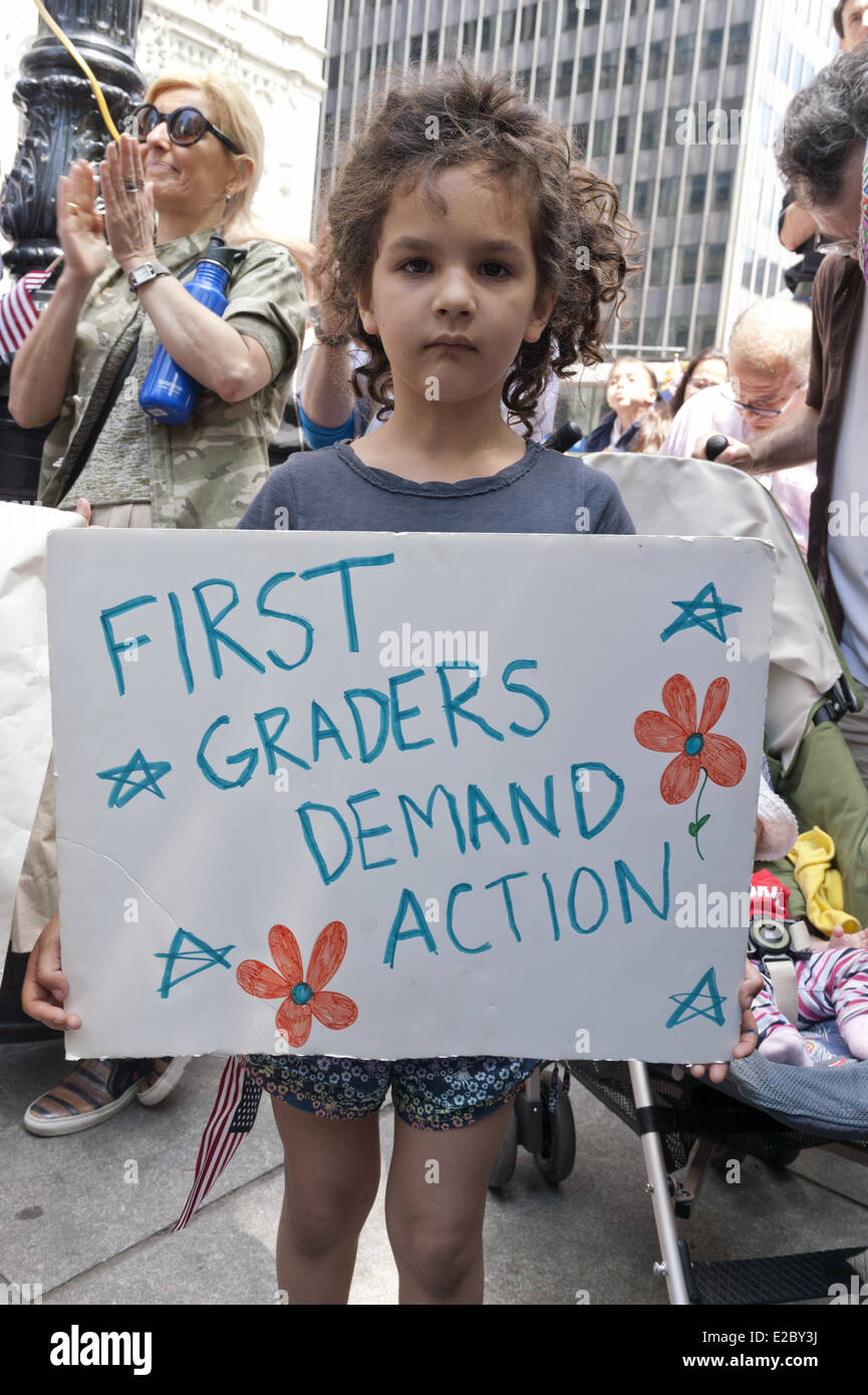 First Grader holds protest sign at The Second Annual Brooklyn Bridge ...