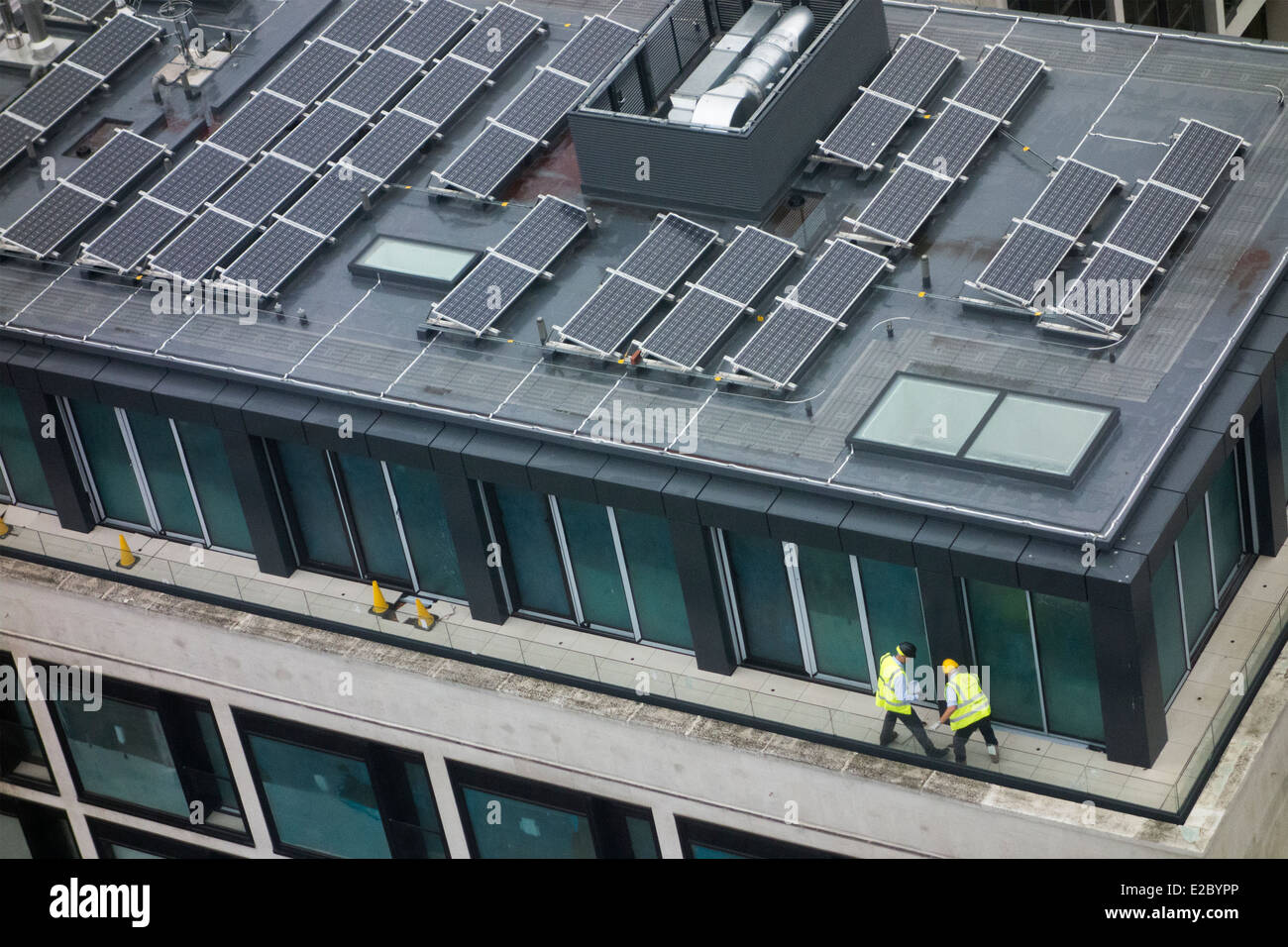 solar batteries on roof in the City of London, uk Stock Photo - Alamy