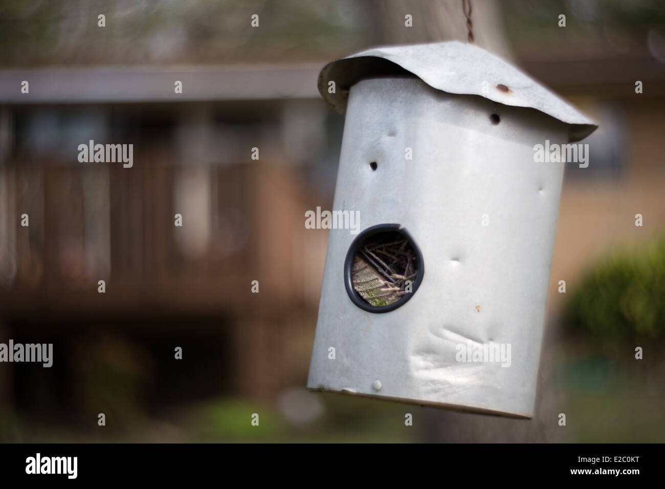 Metal bird house Stock Photo - Alamy