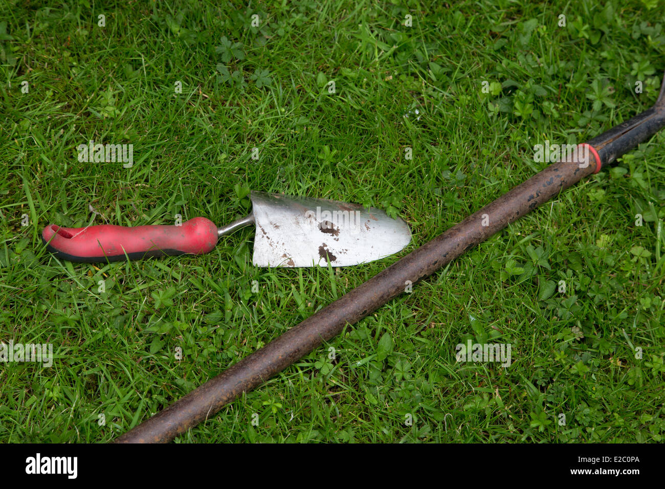 garden trowel and rake Stock Photo - Alamy