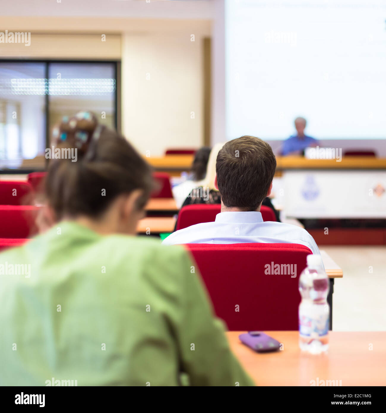 Students listening to the lecture Stock Photo - Alamy