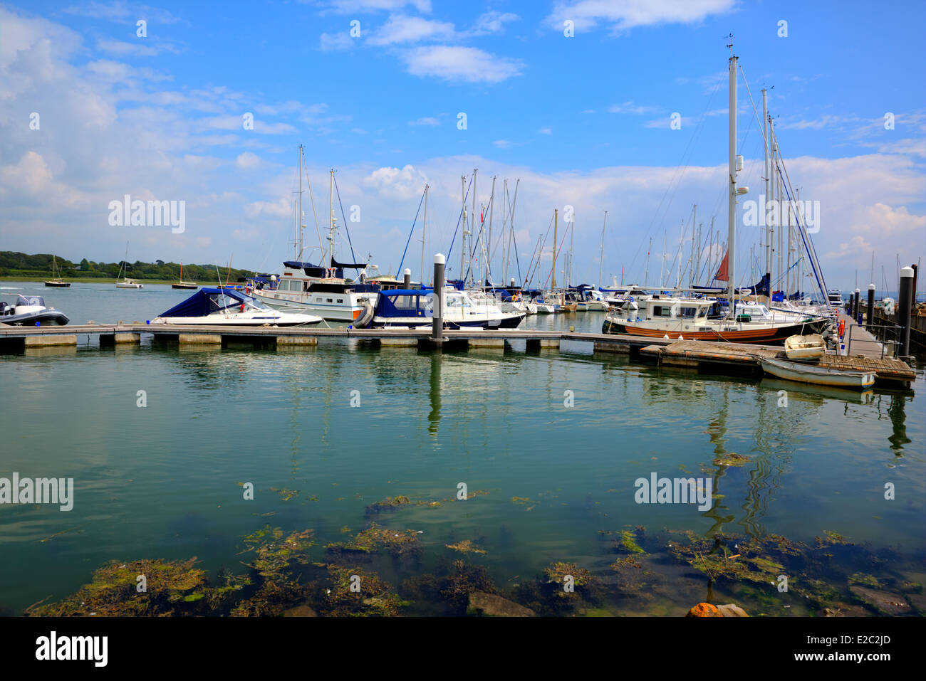 Boats in Lymington harbour Hampshire England uk on the Solent near the ...
