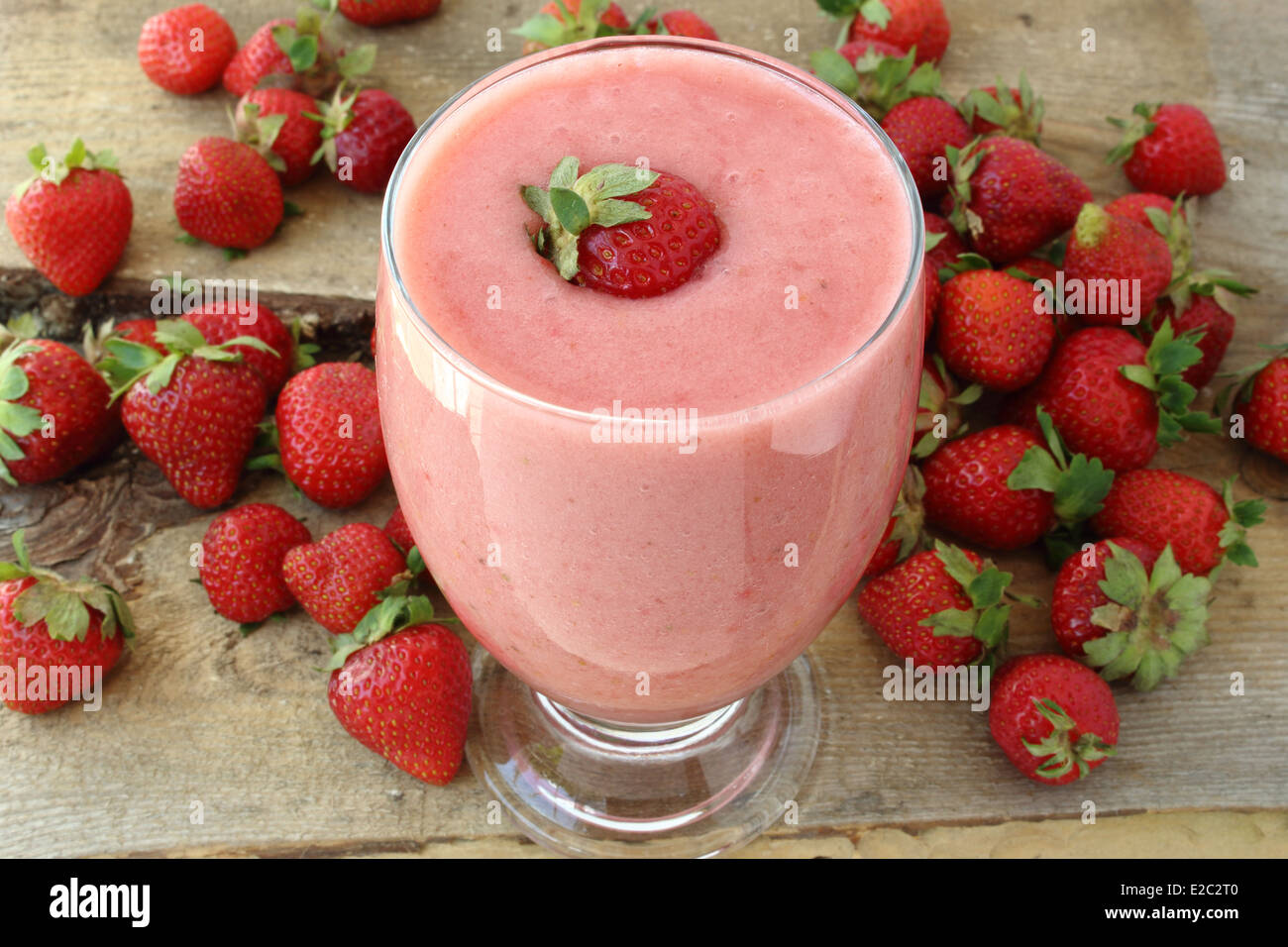 Pink smoothie made with strawberries Stock Photo - Alamy