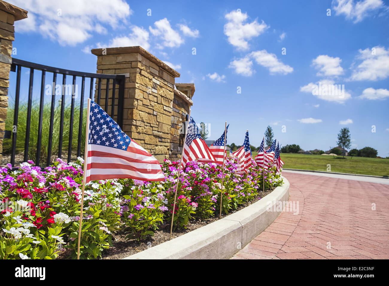 Row of American flags displayed on the street side in celebration of ...