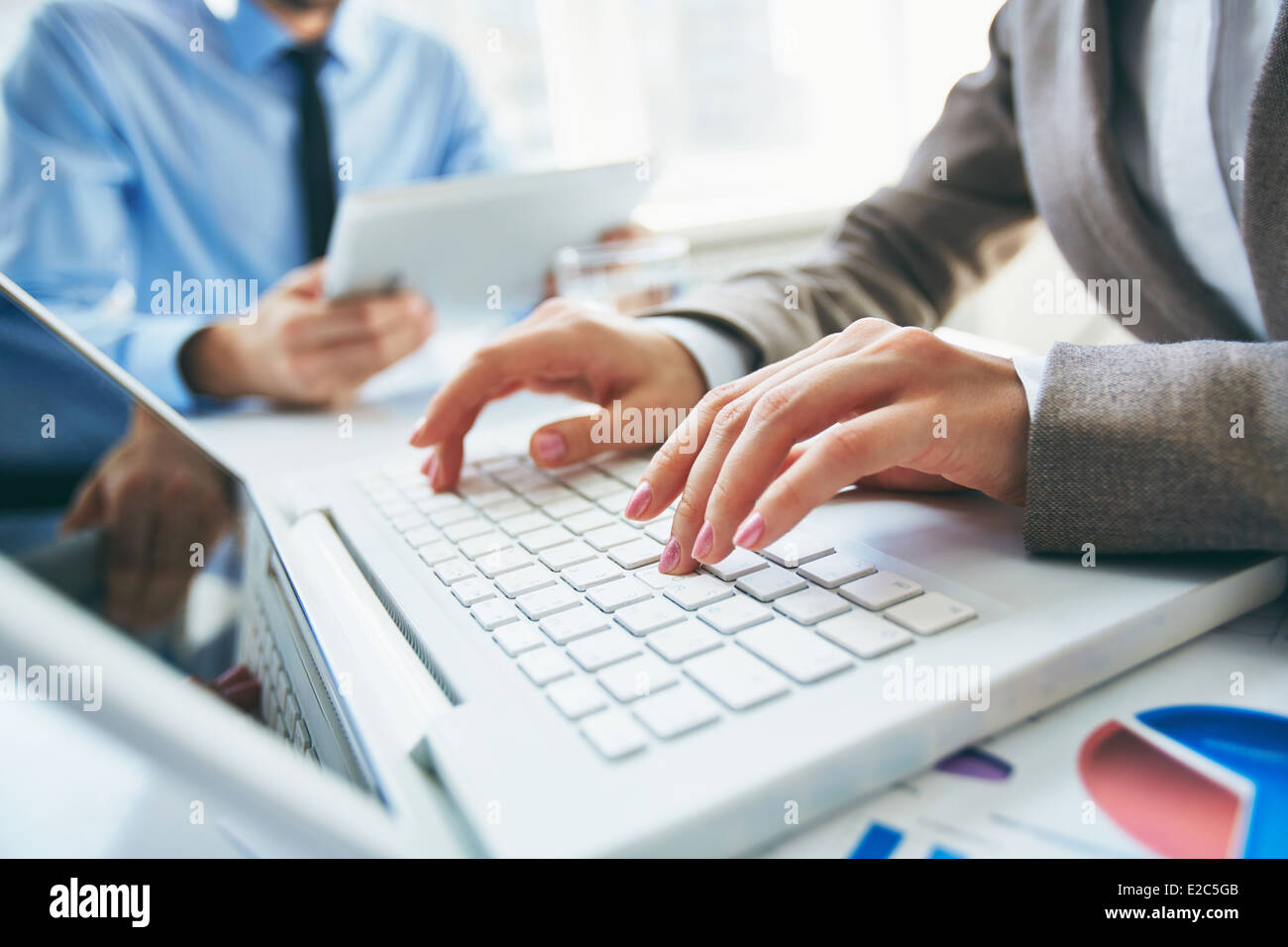 Close-up of young female hands pressing laptop buttons Stock Photo - Alamy