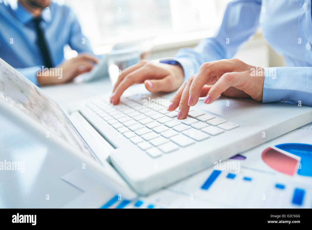Close-up of young female hands pressing laptop buttons Stock Photo - Alamy