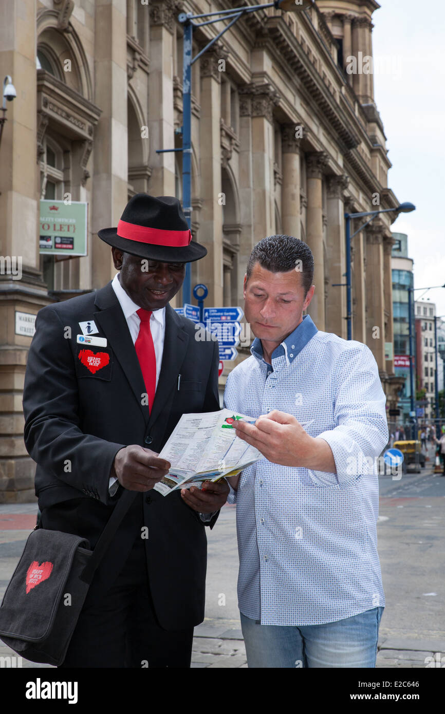 Heart of Manchester BId City Hosts assisting passer-by in the City ...